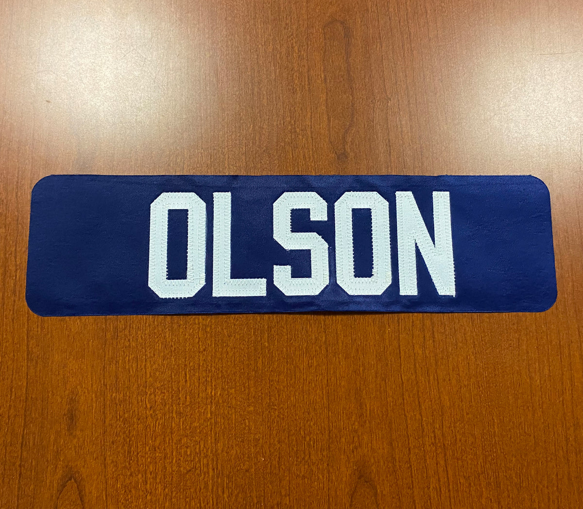 #21 Drew Olson Blue Name Bar – Syracuse Crunch Official Team Store